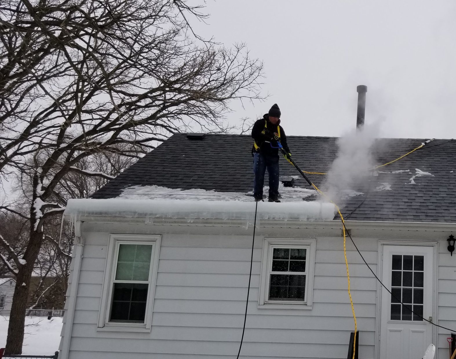 SMC Report: Ice Dam Removal Prevents Problems Later - SMC Construction